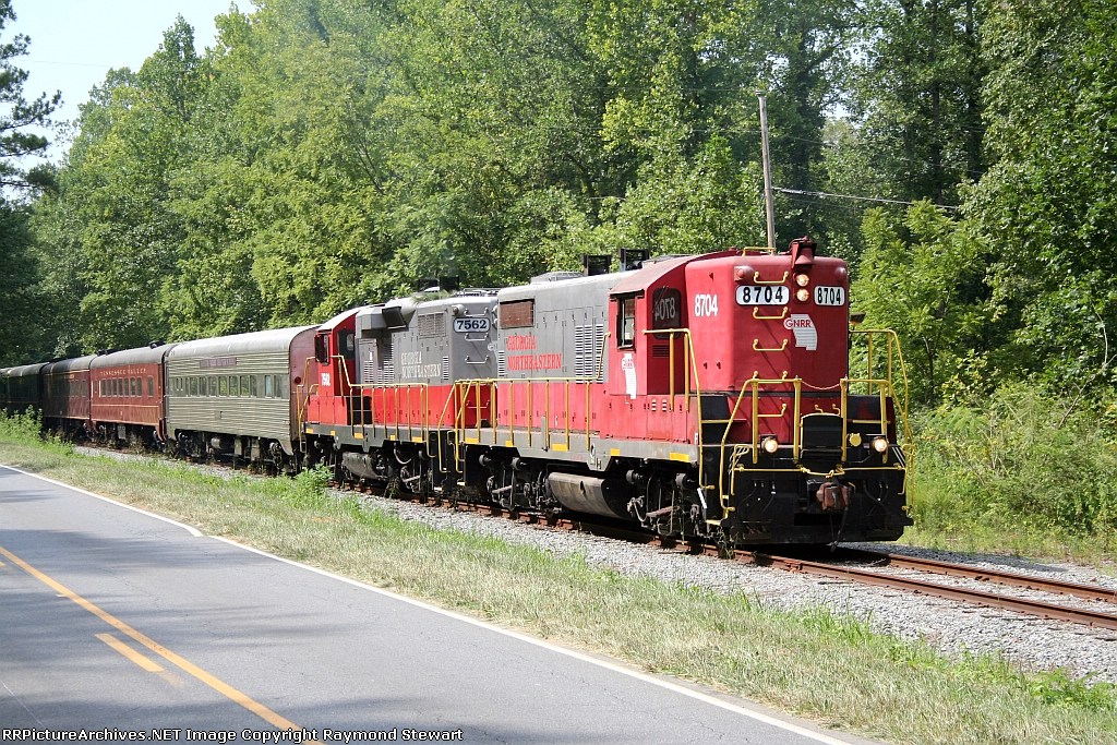 GNRR 8704 making its way back north as it seen here about to cross Carnes Mill Rd.